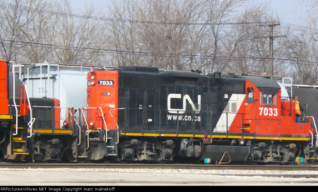 CN 7033